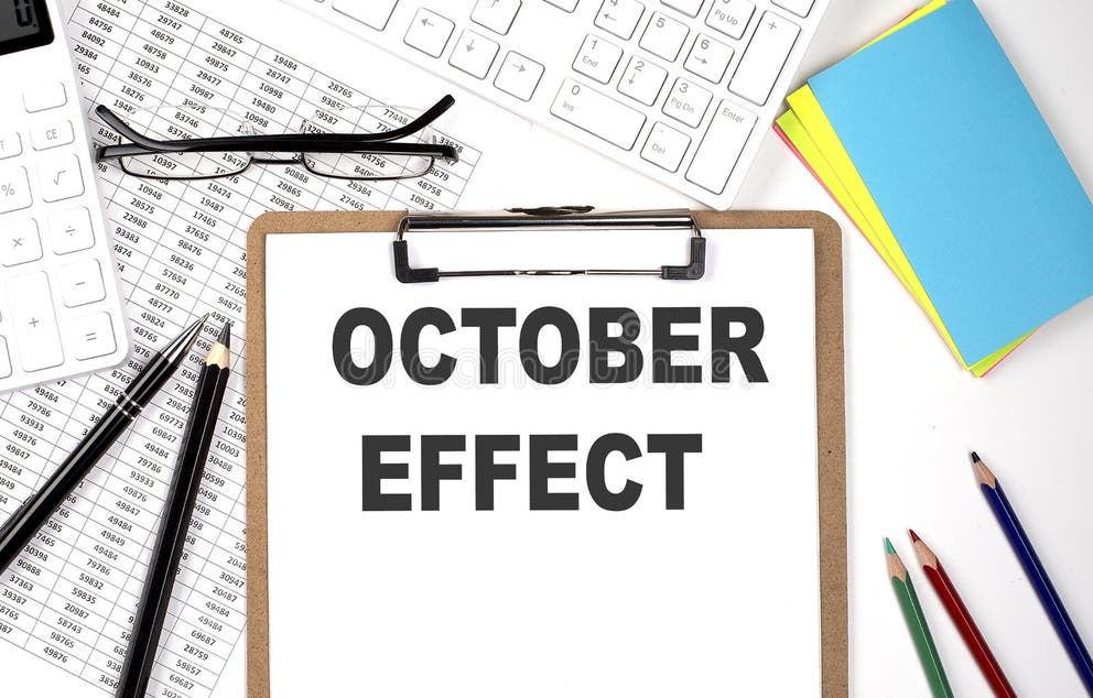 OCTOBER EFFECT Text on Paper Sheet with Chart,keyboard and Calculator ...