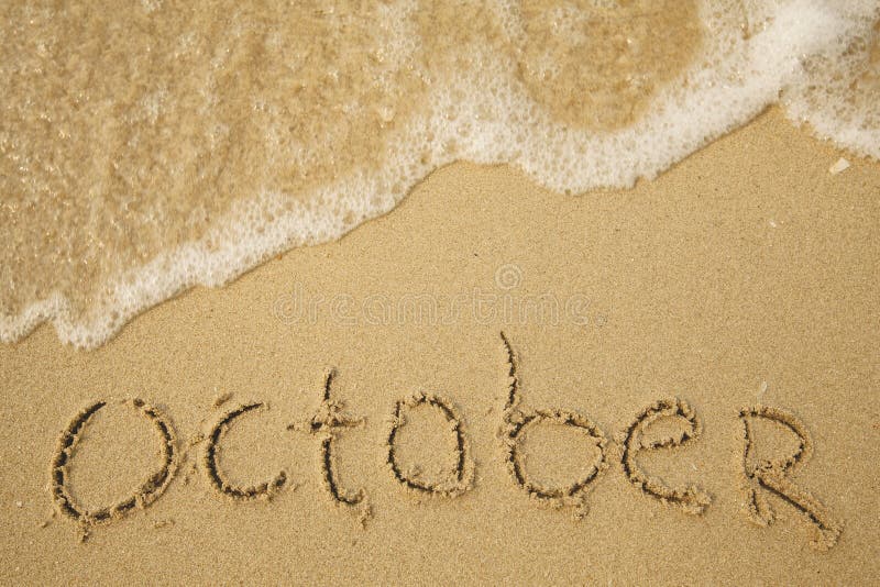 October - Handwritten on the Soft Beach Sand. Stock Image - Image of ...