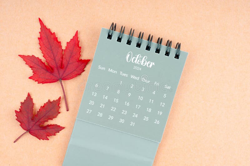 October 2024 Monthly Calendar and Fall Leaves on Brown Stock Photo ...