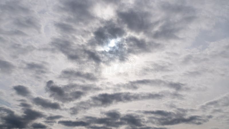 October Sun and Surrounded by Clouds Stock Image - Image of pattern ...