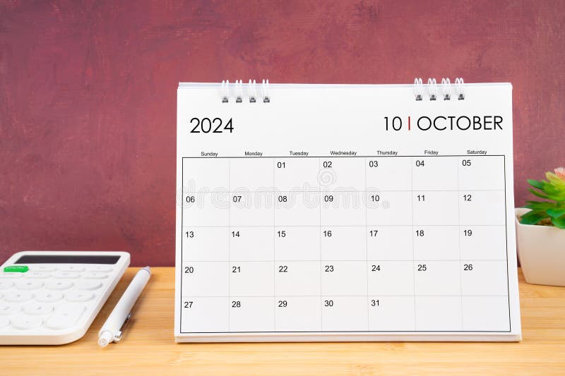 October 2024 White Calendar and Calculator with Pen Stock Photo - Image ...