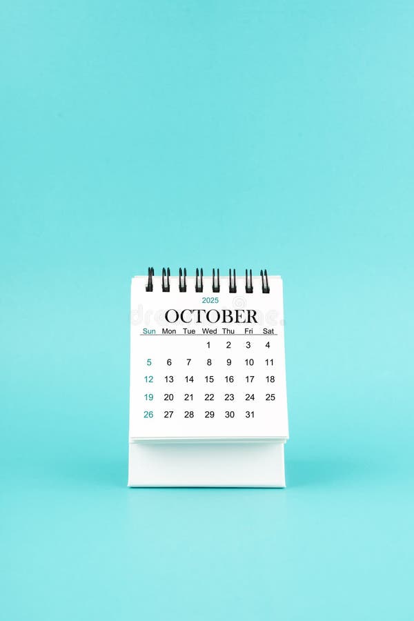 October 2025 White Desk Calendar on Blue Background Stock Photo - Image ...