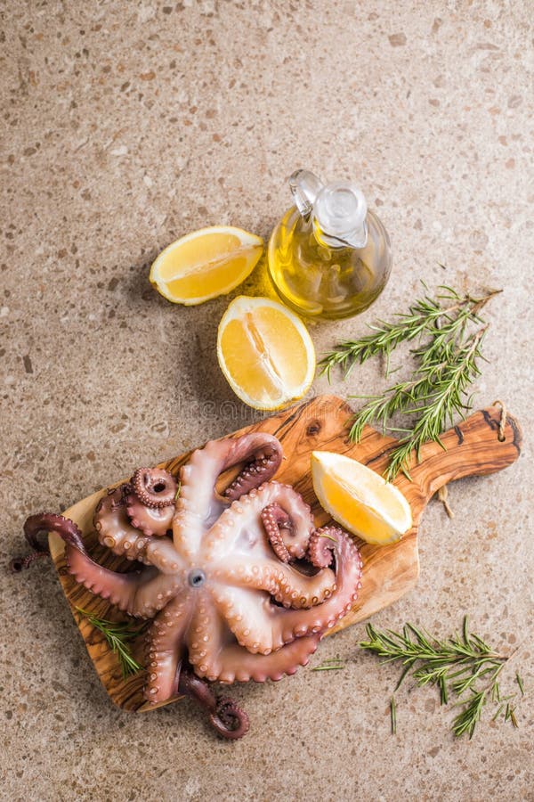 Octopus Cooked with Chopped Herbs Served on a Board Stock Image - Image ...