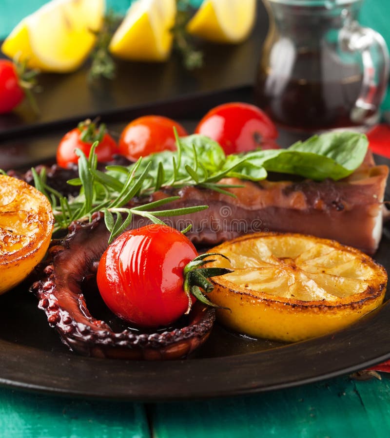 Octopus grilled with lemon stock photo. Image of dieting - 58793170