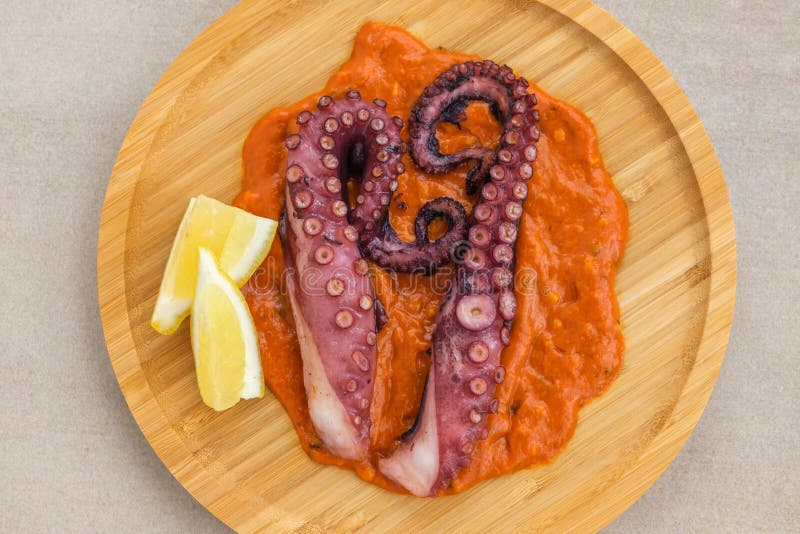 Octopus with romesco sauce stock image. Image of grilled - 248335105