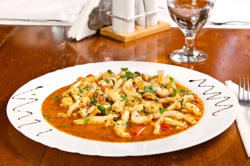 Octopus soup stock image. Image of parsley, healthy, gourmet - 65823679