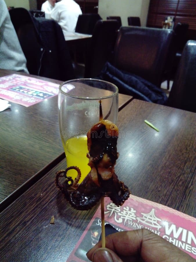 Octopus on Stick editorial photo. Image of octopus, tiny - 84959696