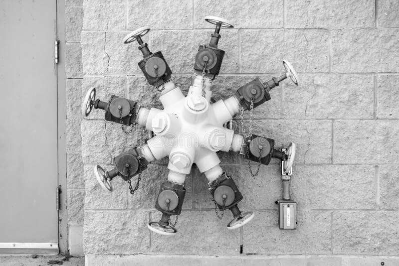 Octuplets Wall Mounted Fire Hydrant Valves Stock Image - Image of ...