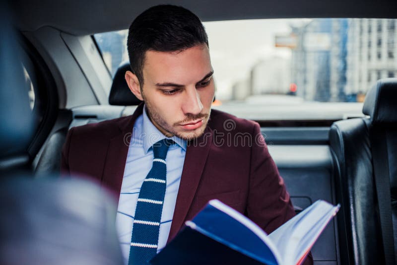 Ocupated Businessman in a Limo Stock Photo - Image of meeting, male ...