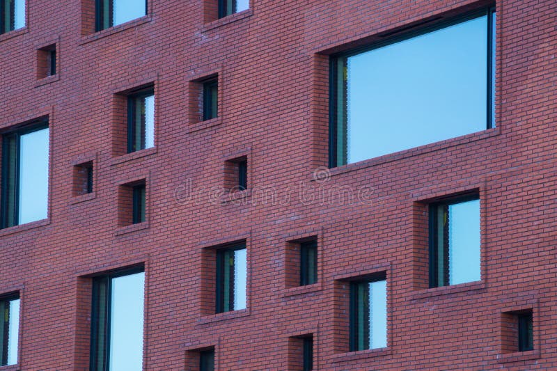Odd Sized Windows on Brick Wall of Modern Building Stock Image - Image ...