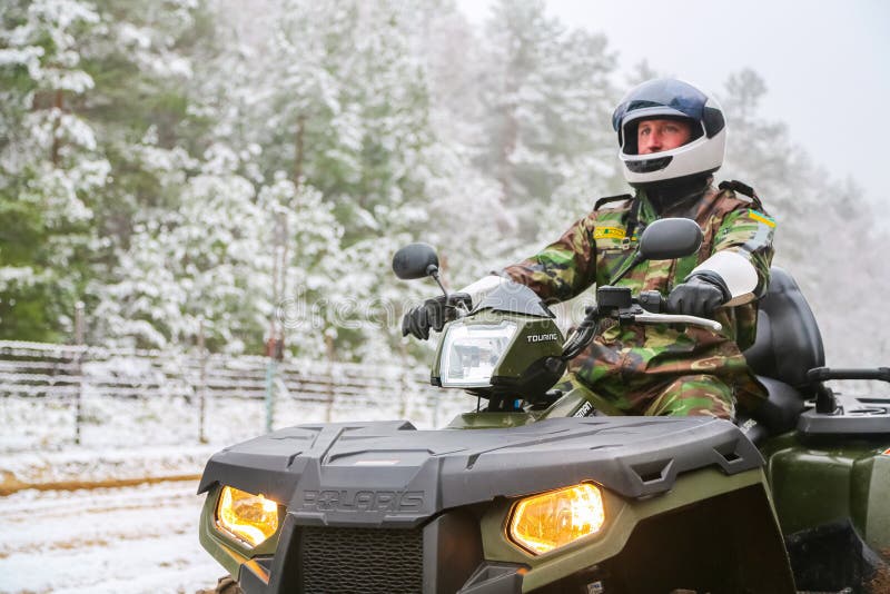 Odessa, Ukraine - December 15, 2015: the Border Guard on ATV Editorial ...