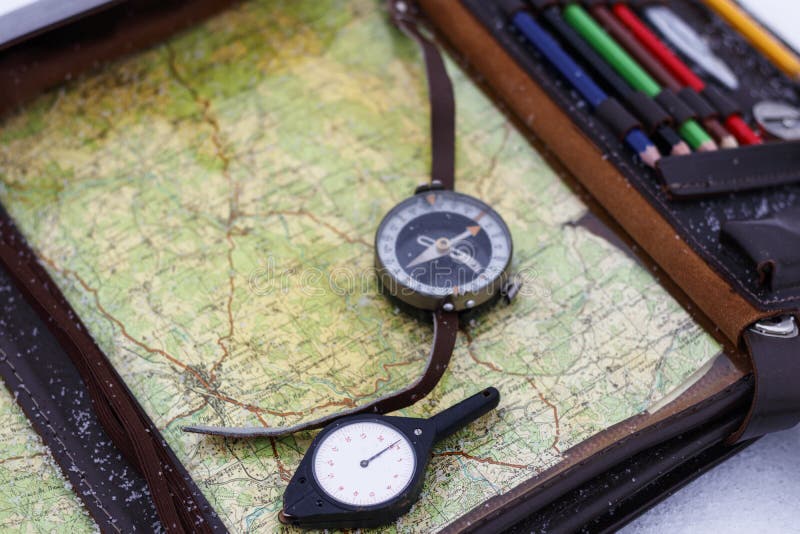 . Odometer in Focus. Military Commander& X27;s Bag with a Compass. Map ...