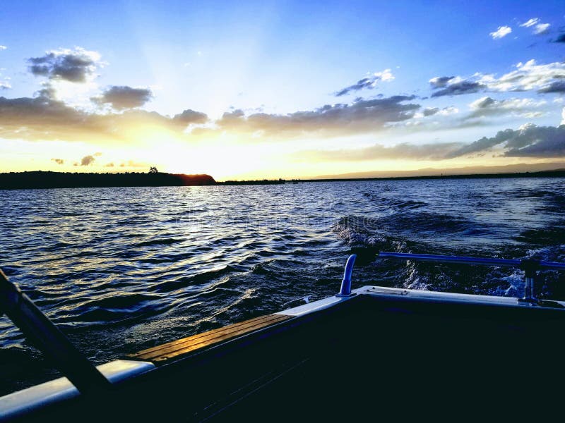 Off Boat sunset stock image. Image of sunset, pueblo - 136923015