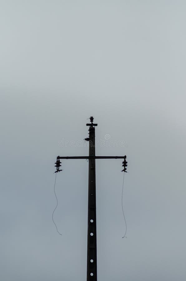 Off-grid Power Pole with Pieces of Wire Dangling from it Stock Photo ...