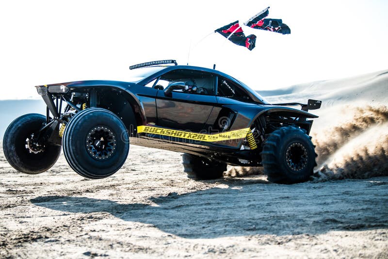 Off Road Buggy Car in the Sand Dunes of the Qatari Desert. Editorial ...
