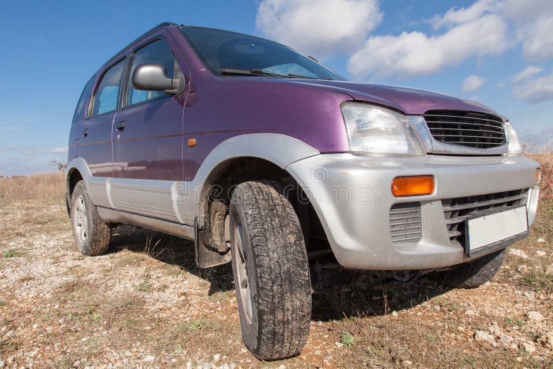 Off Road Car Against Bright Cloudy Sky. Crossover ,SUV Car Stock Photo ...