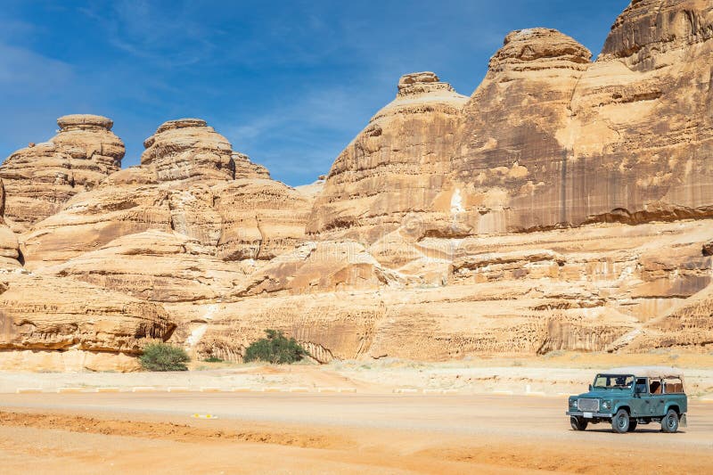 Off-road Car and Desert Cliffs Formations Landscape at Hegra, Al Ula ...