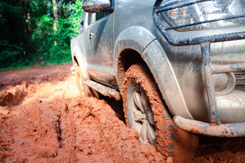 Off Road Cars on Muddy Road. Low Angle View of Front of SUV on Mountain ...