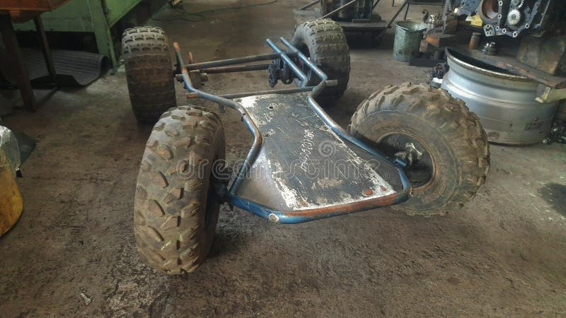 Off-road Go-kart Frame on a Workshop Floor, Showcasing Vehicle ...