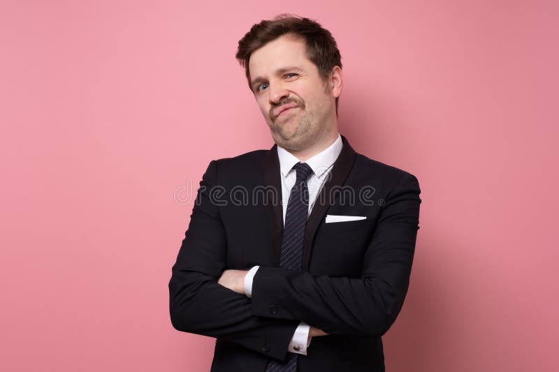 Offended Young Man in Suit, Looking at Camera with Suspicion, Feeling ...