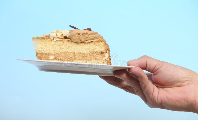 Offering cake stock image. Image of holding, hand, whipped - 21187189