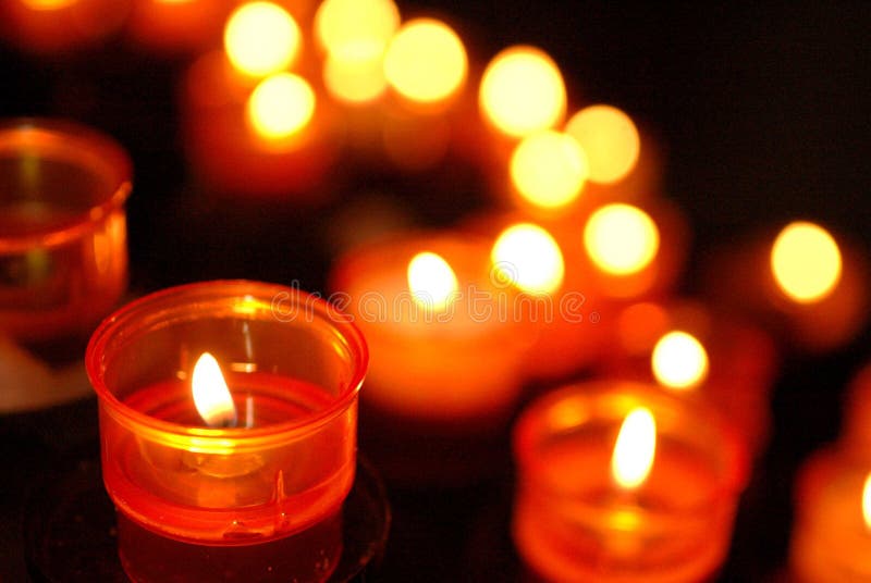 Offering Candles stock image. Image of light, soul, flame - 5575995
