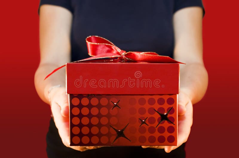 Offering a gift stock image. Image of share, give, xmas - 7379287