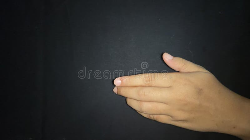 Offering a Hand in a Gesture Inviting a Handshake. on Black Background ...