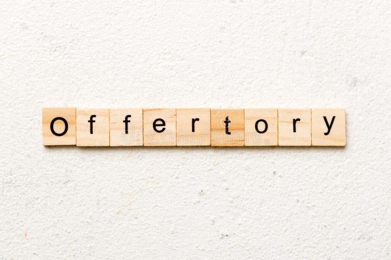 Offertory Word Written on Wood Block. Offertory Text on Table, Concept ...