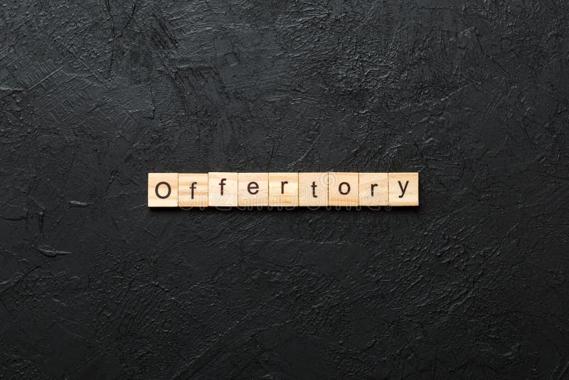 Offertory Word Written on Wood Block. Offertory Text on Table, Concept ...