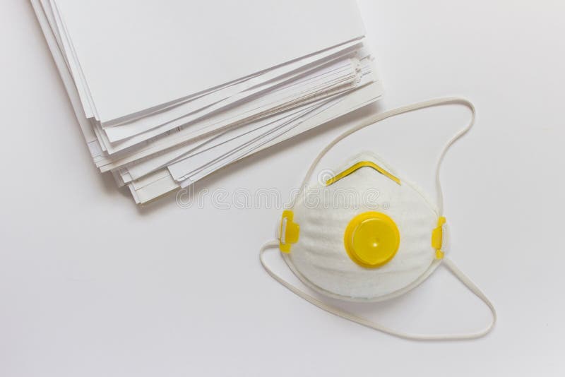Office Blank Paper with Face Protective Mask on White Backgound Stock ...
