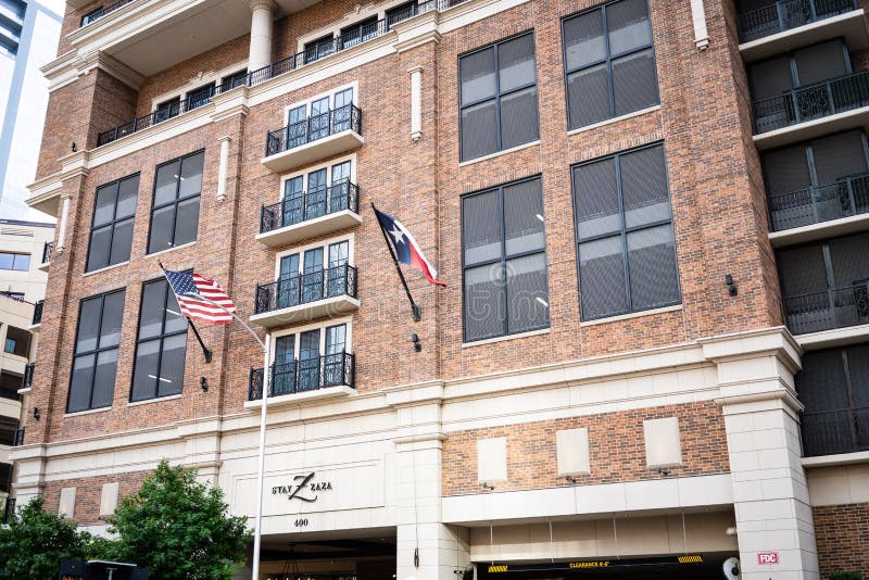 Office Building with American and Texas Flag Flying Stock Image - Image ...