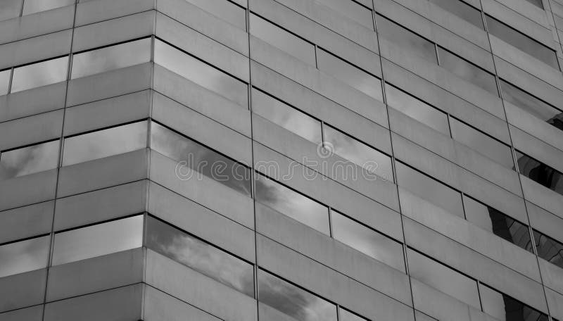 Office Building Corner with Reflections in Glass Stock Photo - Image of ...