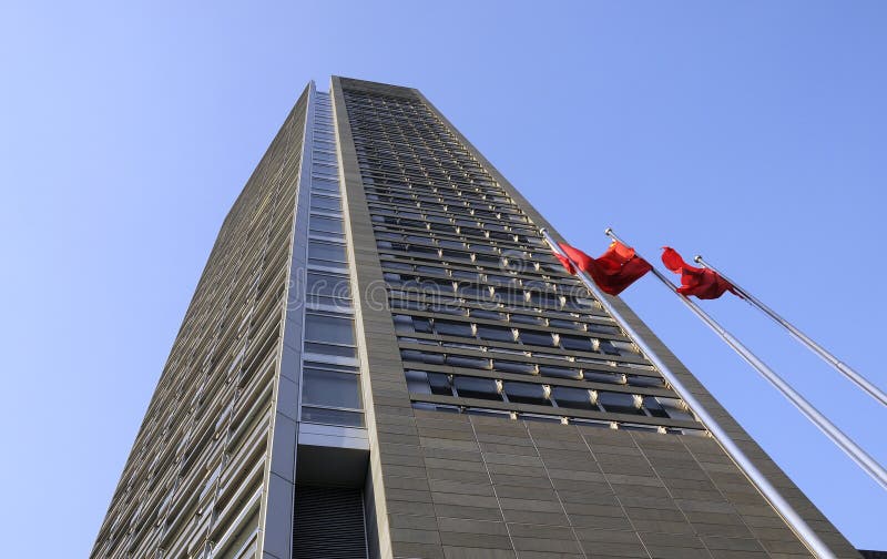 Office building with flags stock photo. Image of landmark - 6465474