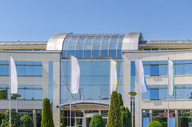 Office Building Flags stock photo. Image of spring, windows - 266584928