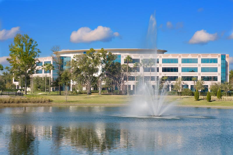 Office Building with Fountain Stock Photo - Image of glass, landscaping ...