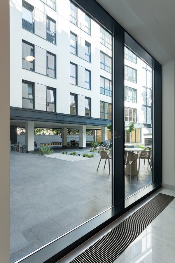 Office Building with Glass Wall Stock Photo - Image of lounge, public ...