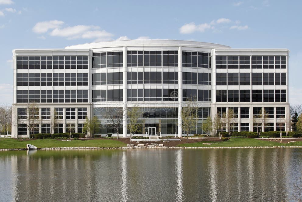 Office building with lake stock photo. Image of glass - 9279402