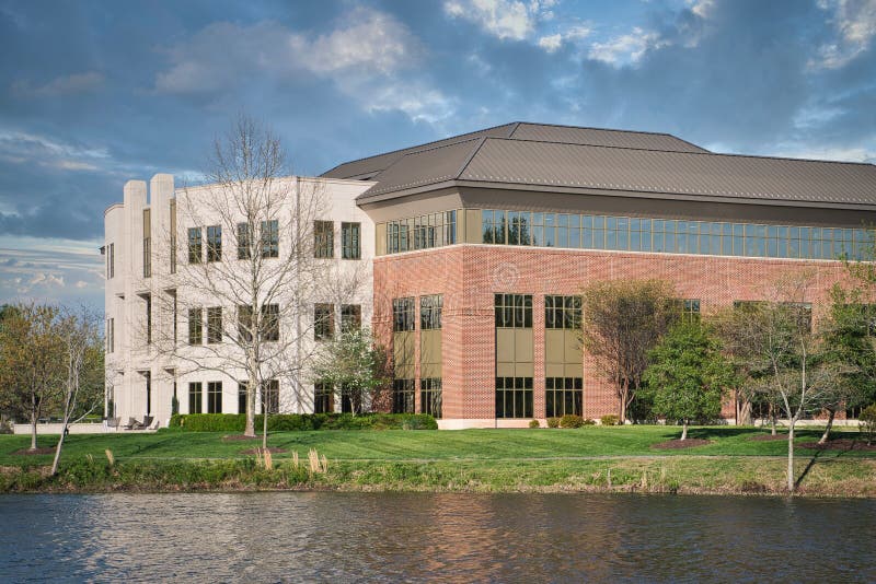 Office Building on a Lake with Trees and Grass Stock Photo - Image of ...