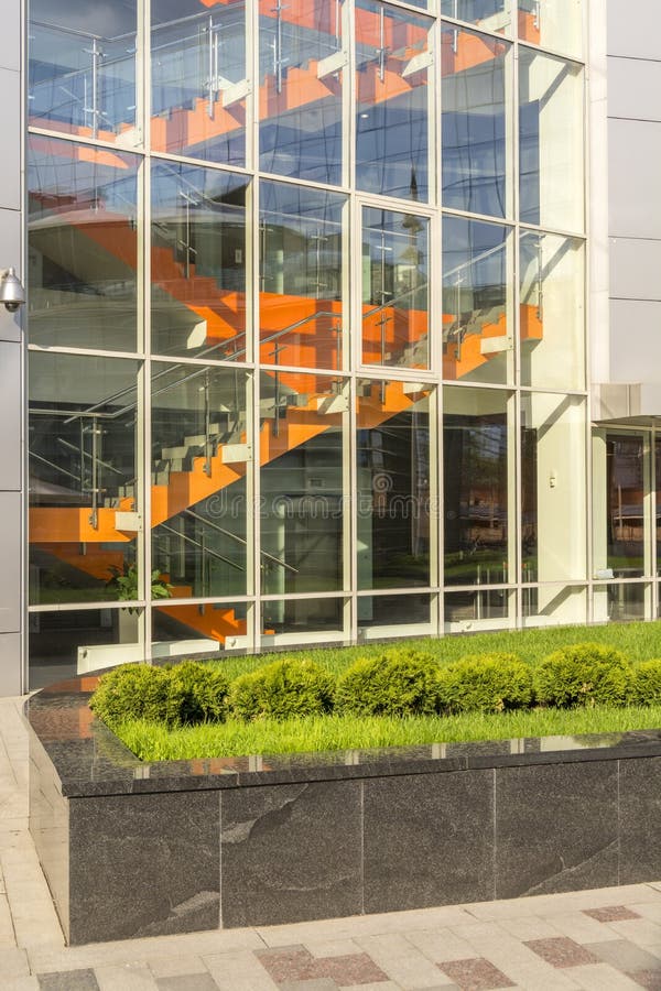 Office Building with Large Windows through Which the Staircase is ...
