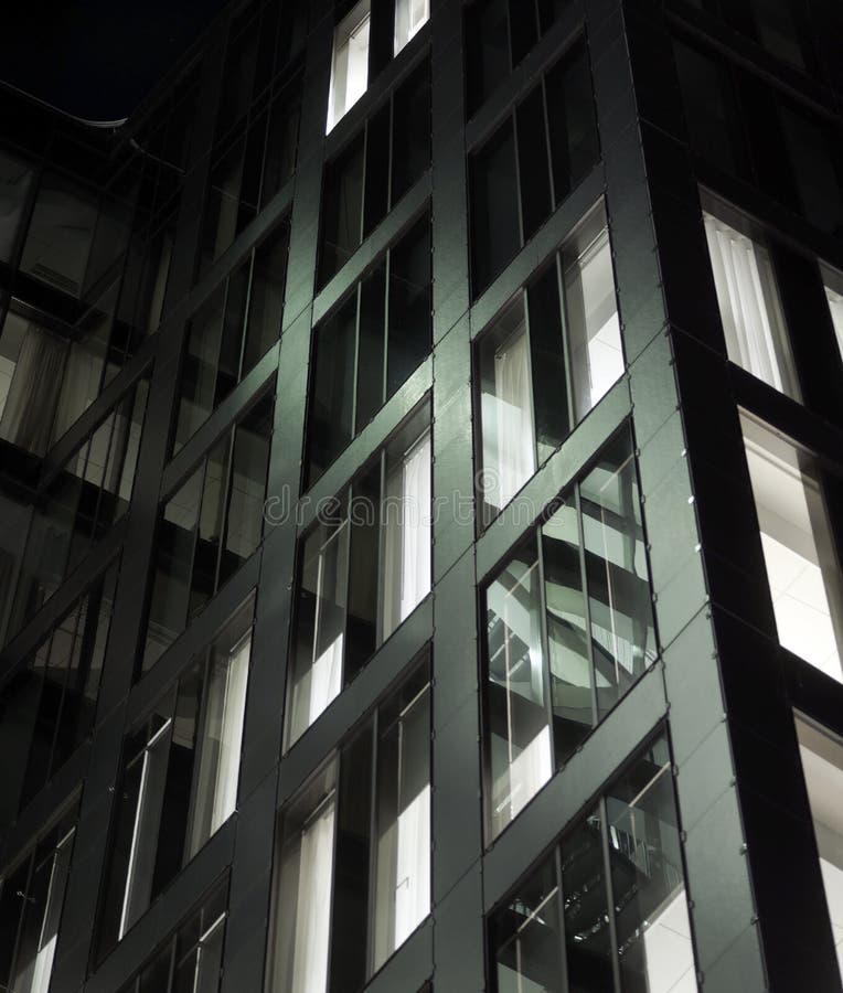 Close-up on an Office Building in the Evening with Some Lightened ...