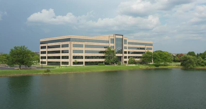 Office Building with Pond in a Suburban Setting Stock Video - Video of ...