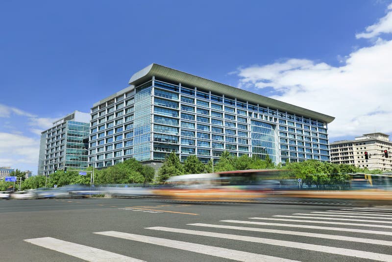 Office Building with Traffic in Motion Blur Stock Photo - Image of ...