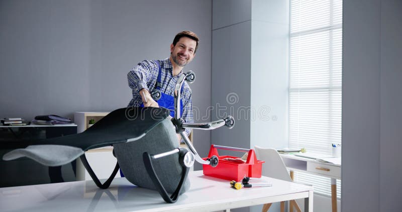 Office Chair Assembling and Repair. Man Working Stock Photo - Image of ...