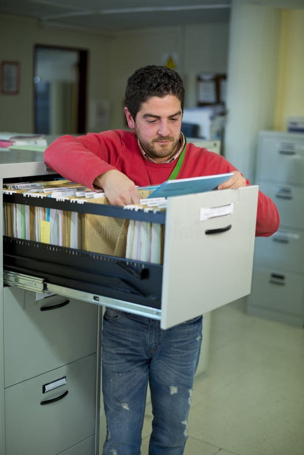 Office Clerk Looking Some Files Stock Image - Image of real, drawer ...
