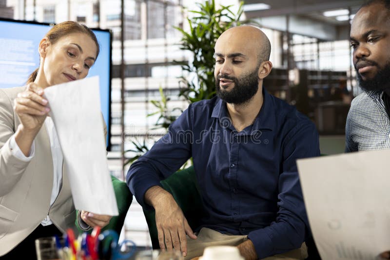 Office Clerks Showing Manager Company Documents Stock Photo - Image of ...