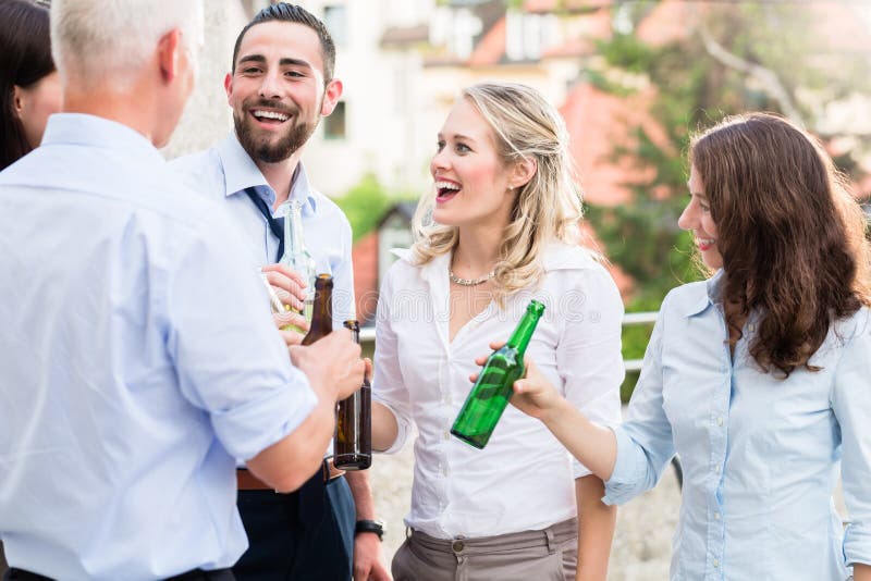 Office Colleagues Drinking Beer after Work Stock Photo - Image of event ...