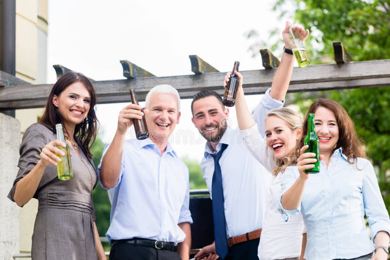 Office Colleagues Drinking Beer after Work Stock Image - Image of ...