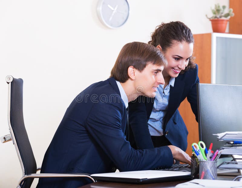 Office Colleagues Successfully Working Together Stock Photo - Image of ...