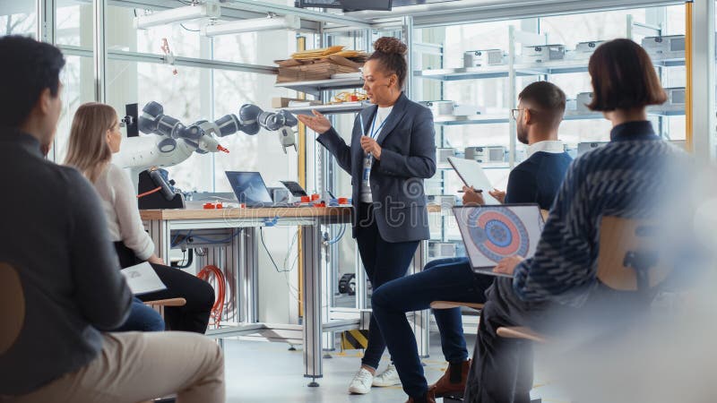 Office Conference Room Meeting: Black Female Software Developer Doing ...